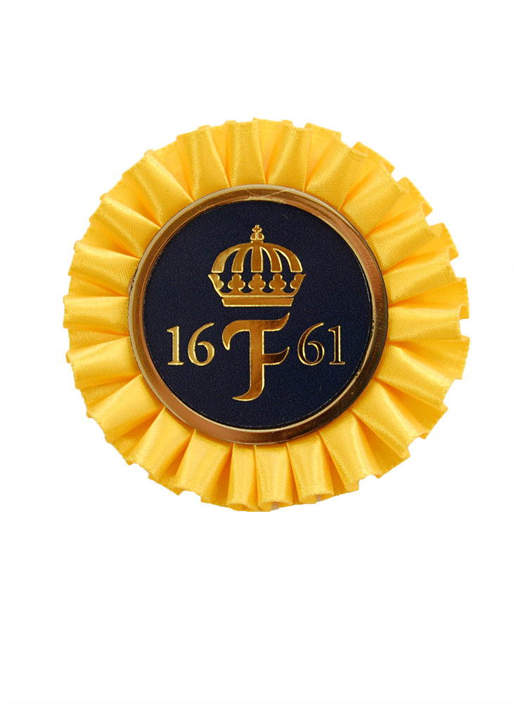 Monomak - Kampanjknapp med tryck och tygring/kokard