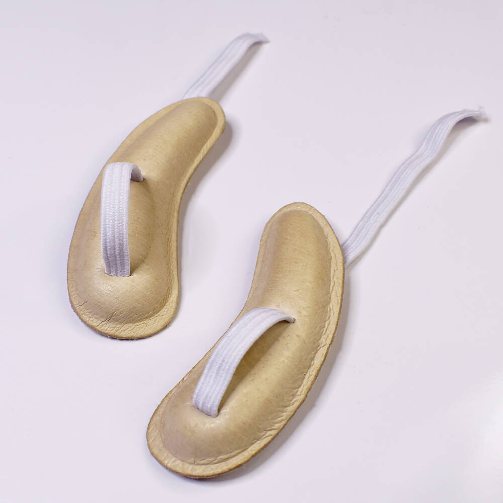 Deramed hamerteen correctie in leder | MedicOnline